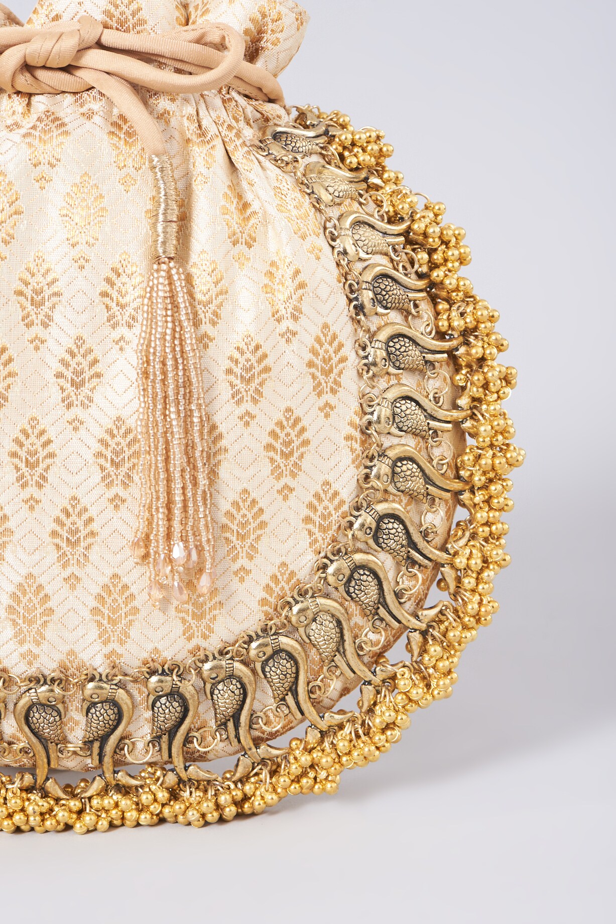 Light Gold Polyester Embellished Potli Design by 5 Elements at Pernia's ...