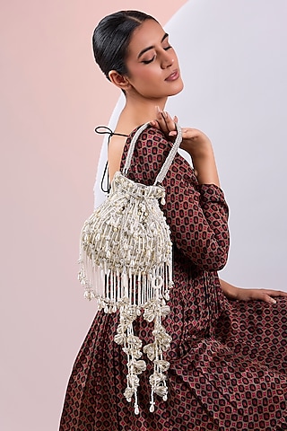 White Brass Metal & Faux Pearl Potli by AMAMA at Pernia's Pop Up Shop 2026