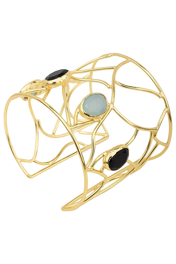 Gold plated aqua and black stone handcuff available only at Pernia's ...