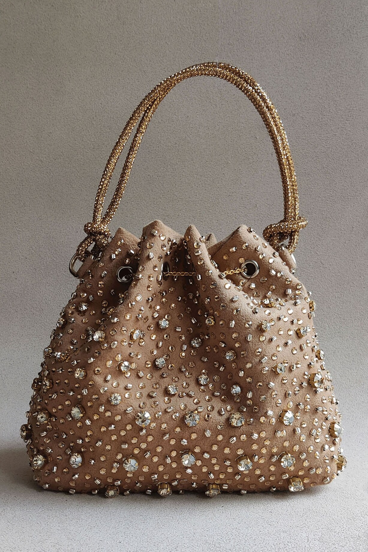 Gold Hand Embellished Bucket Bag by PLODE at Pernia's Pop Up Shop 2026