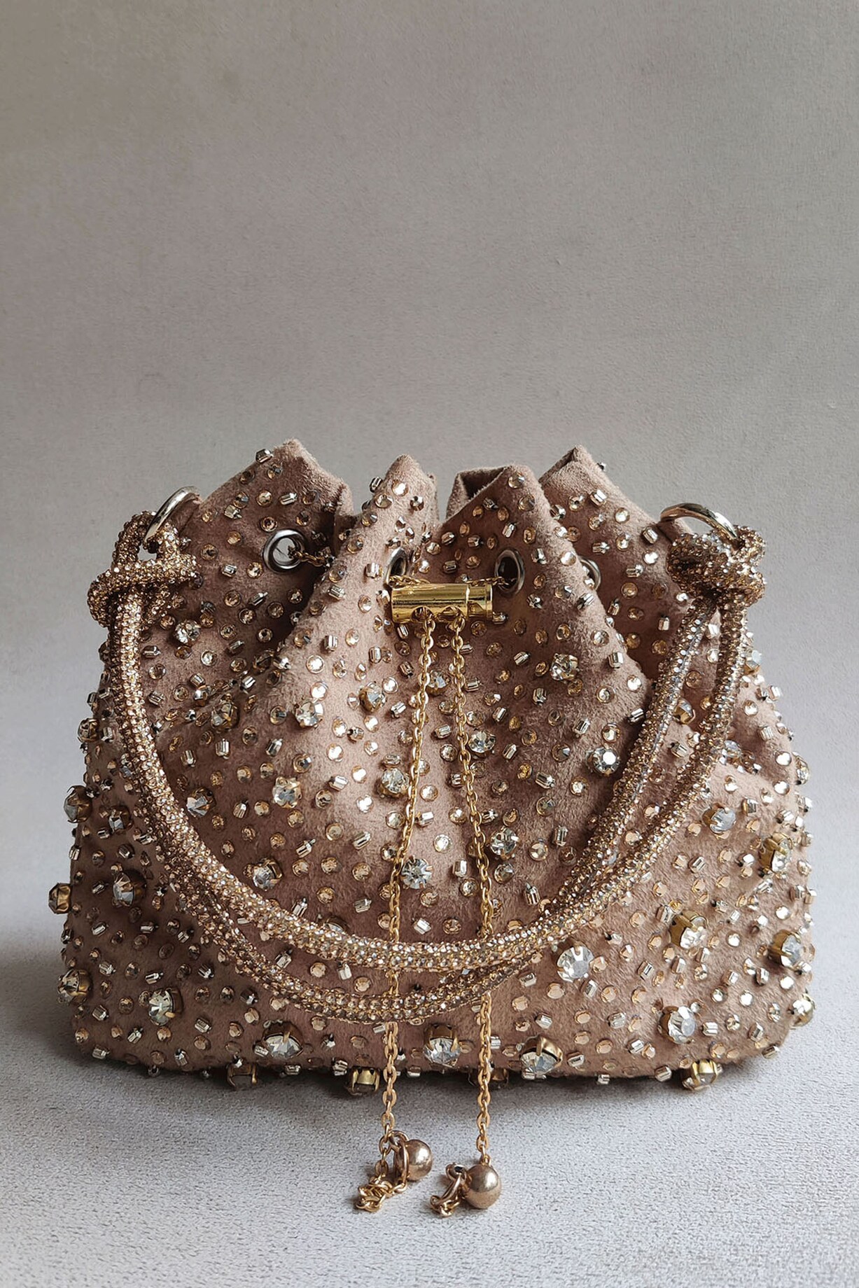 Gold Hand Embellished Bucket Bag by PLODE at Pernia's Pop Up Shop 2026