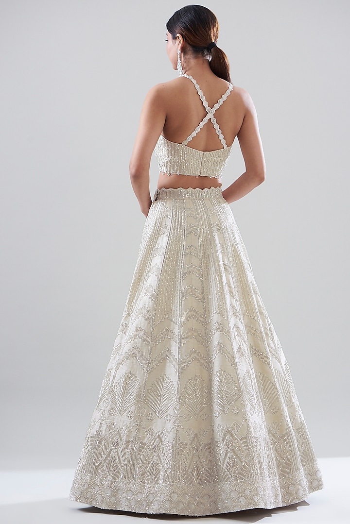 Ivory Raw Silk Embellished Lehenga Set Design by Disha Patil at Pernia ...