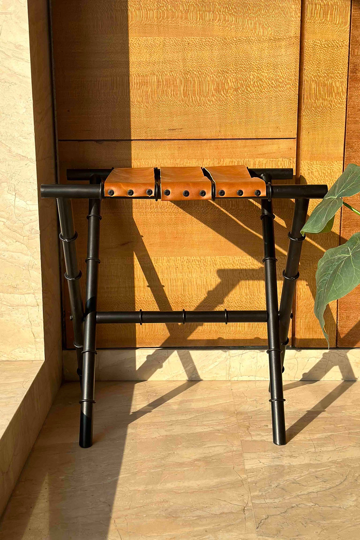 Tan Iron & Faux Leather Foldable Luggage Rack by Mason Home at Pernia's ...