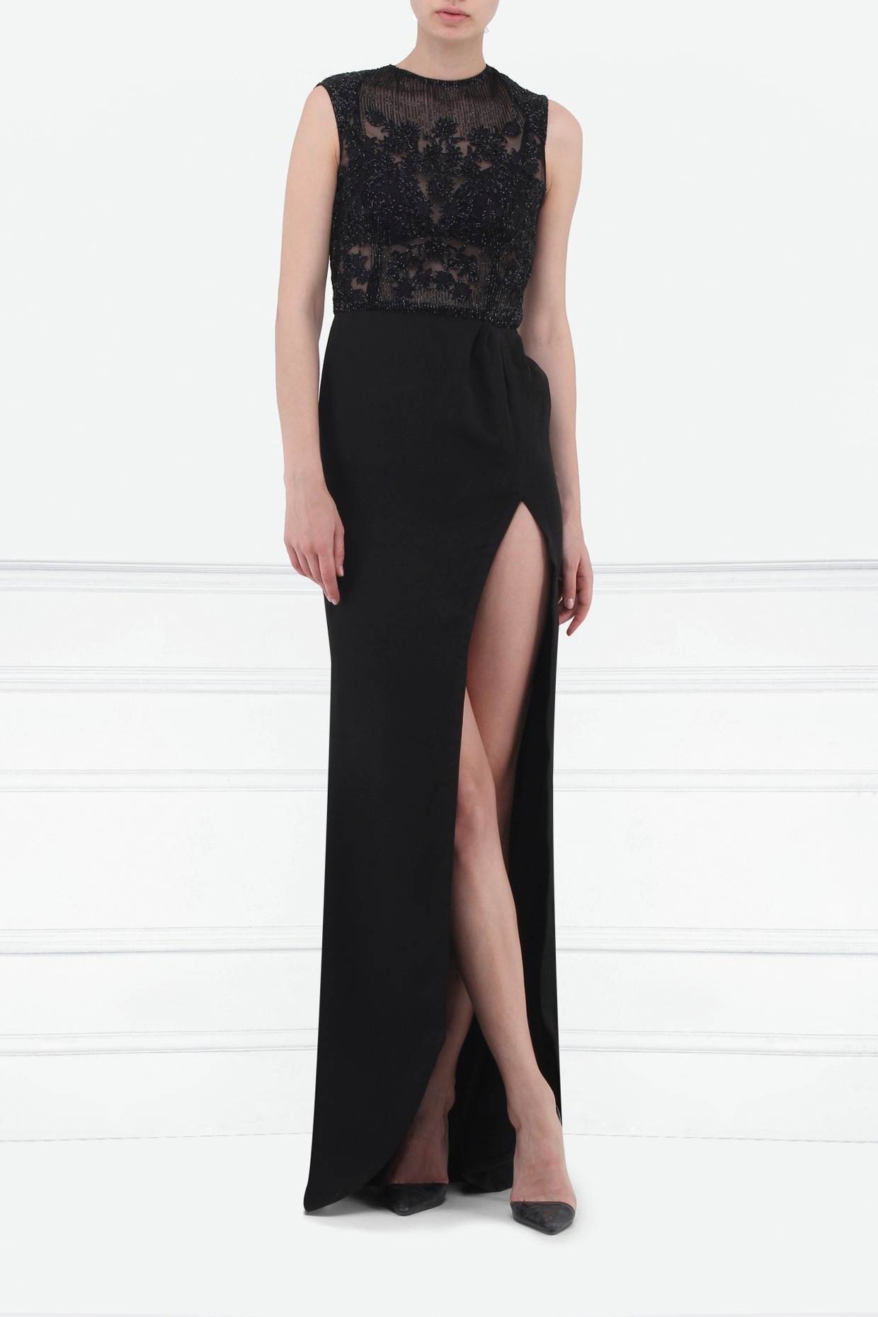 Black embroidered slit gown available only at Pernia's Pop Up Shop. 2025