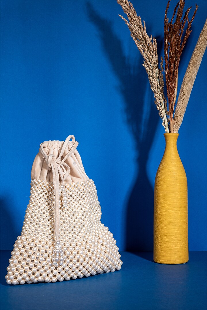 Ivory Handcrafted Potli Design by Forever Noor at Pernia's Pop Up Shop 2023