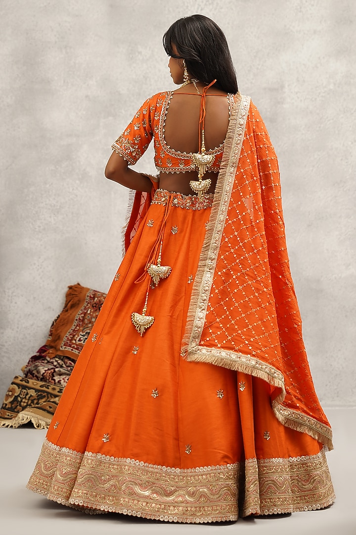 Orange Raw Silk Hand & Machine Embroidered Wedding Lehenga Set by Kapda ...