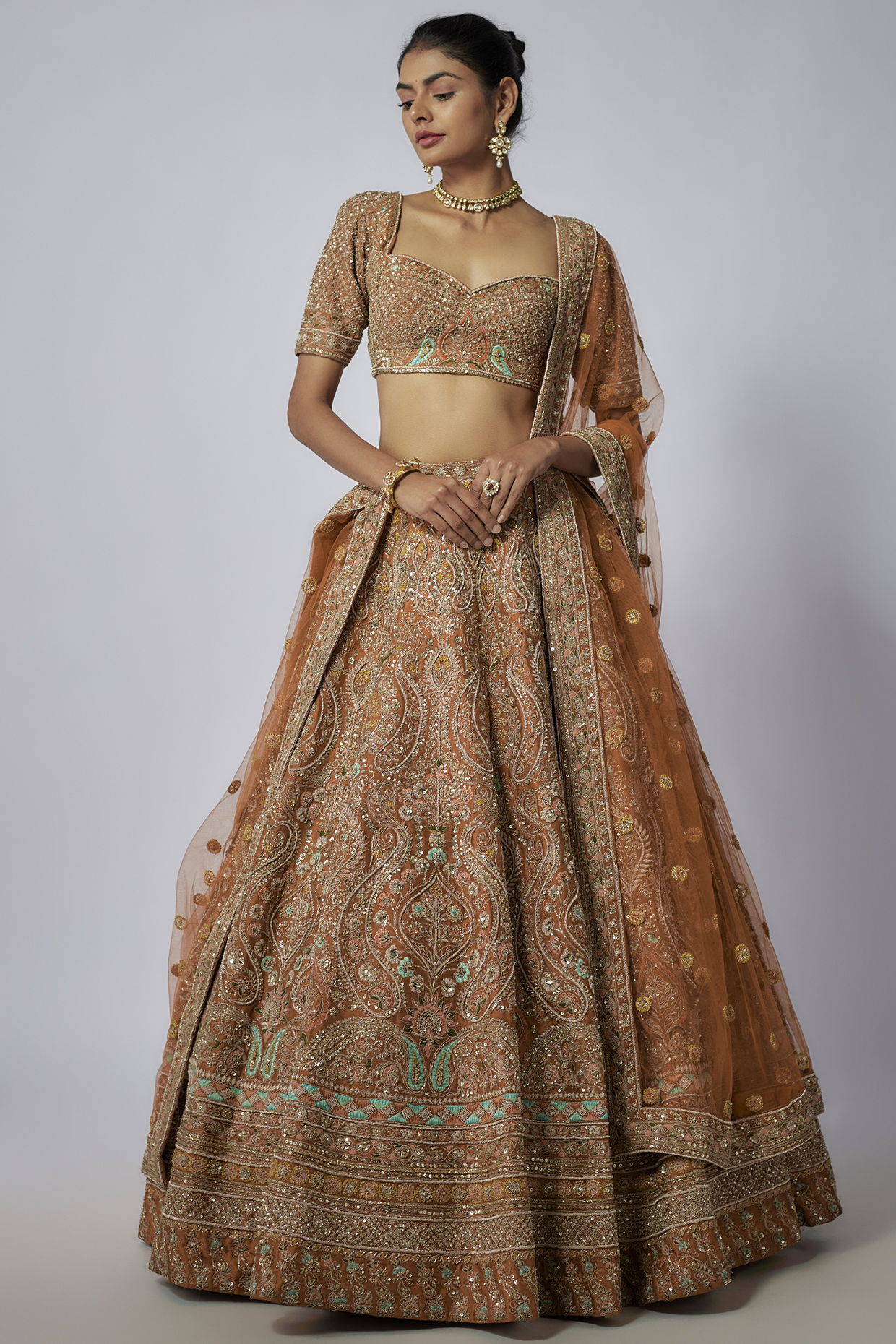 Rust Raw Silk Embellished Bridal Lehenga Set By Kalighata At Pernias