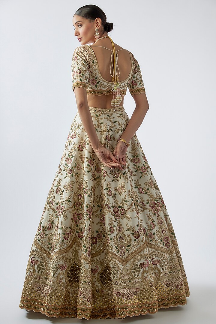 Ivory Raw Silk Embellished Bridal Lehenga Set By Kalighata At Pernias