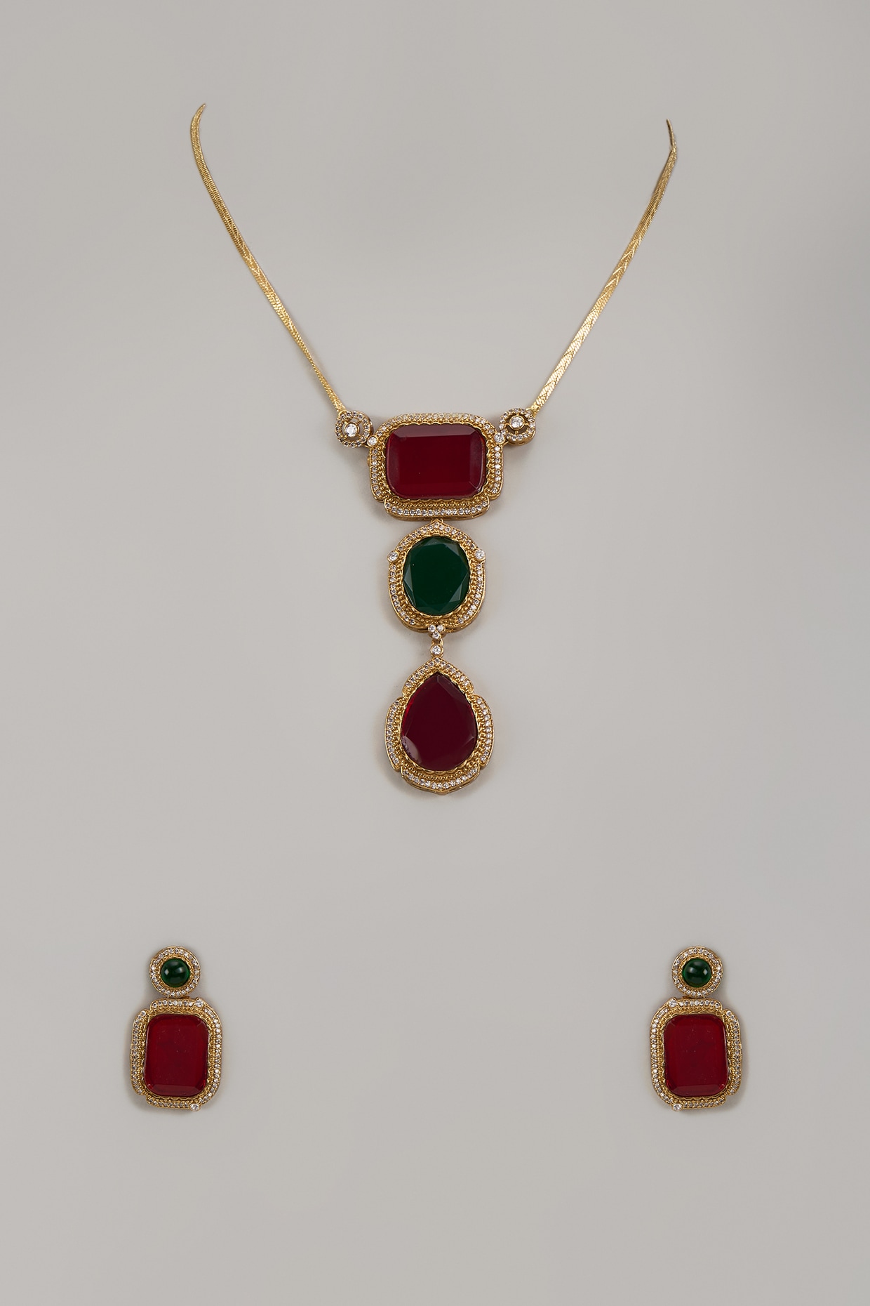 Gold Finish Red Stone Pendant Necklace Set by Khushi Jewels at Pernia's ...