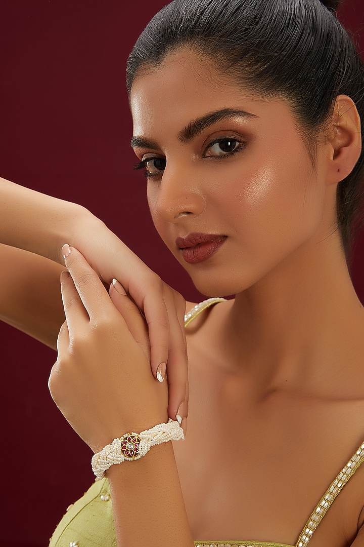 Dull Gold Finish Pleated Pearl Bracelet by Just Shraddha at Pernia's ...