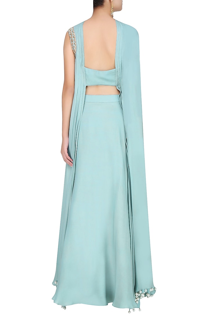 Frost blue rosette motif embroidered cape with matching skirt available ...