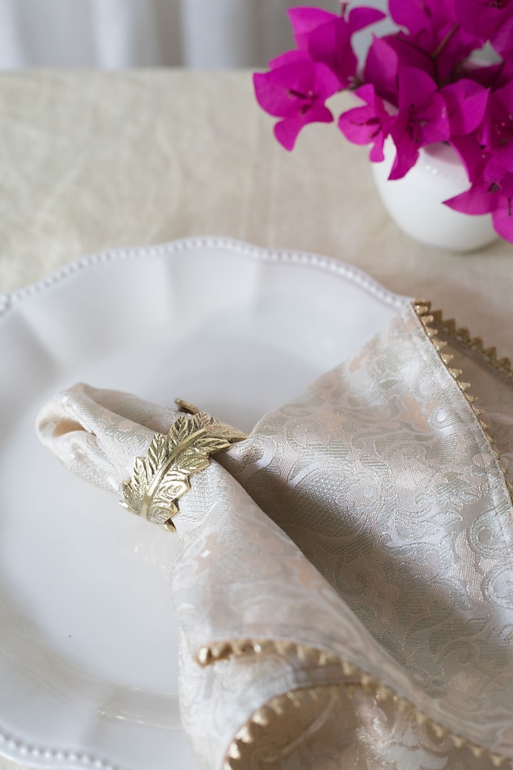 Off White Table Napkins With Golden Border by Chrysante By Gunjan Gupta ...