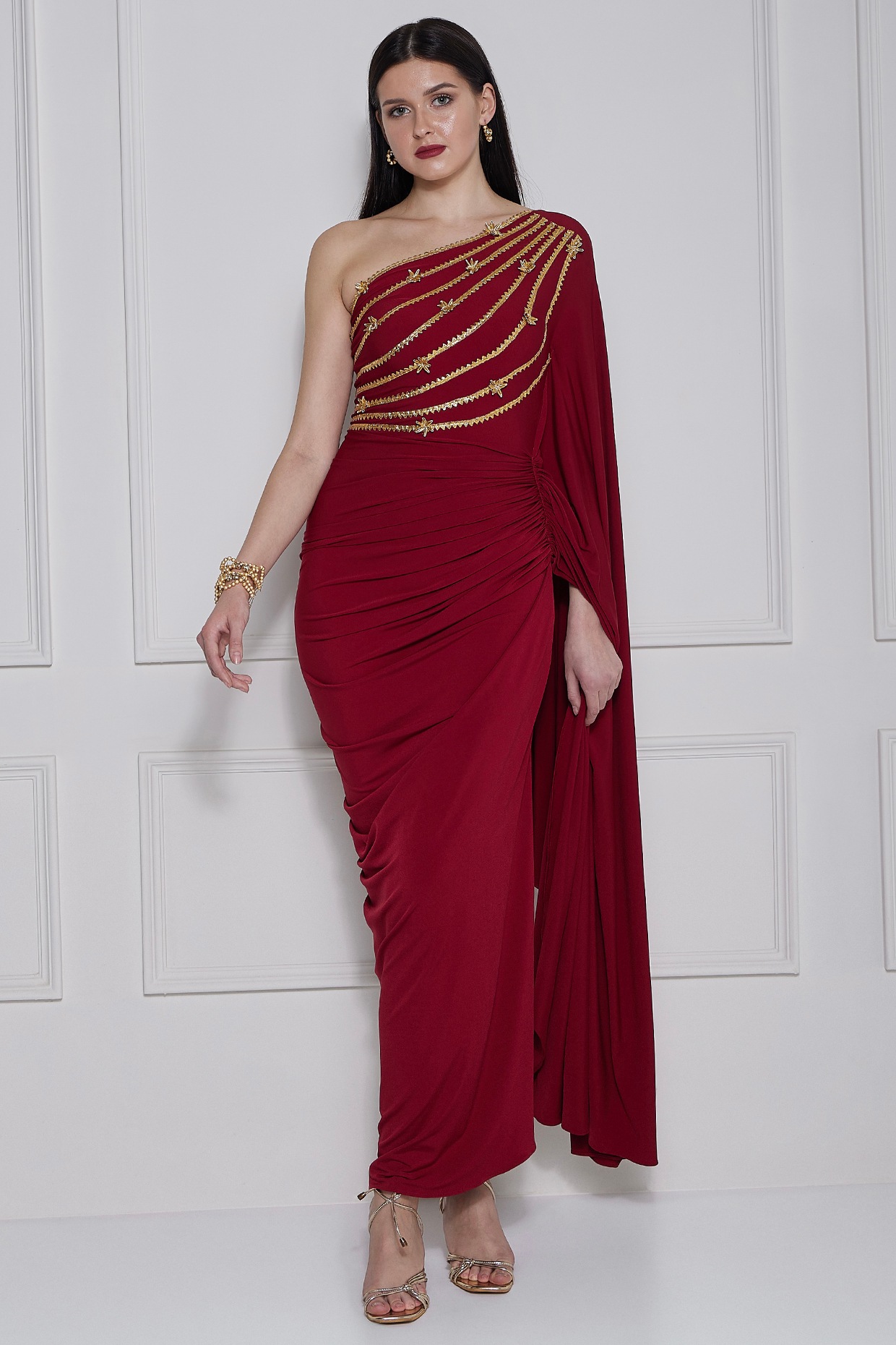 Maroon Stretch Knit Gota-Patti Work One-Shoulder Gown by Naina Seth at Pernia's Pop Up Shop 2025