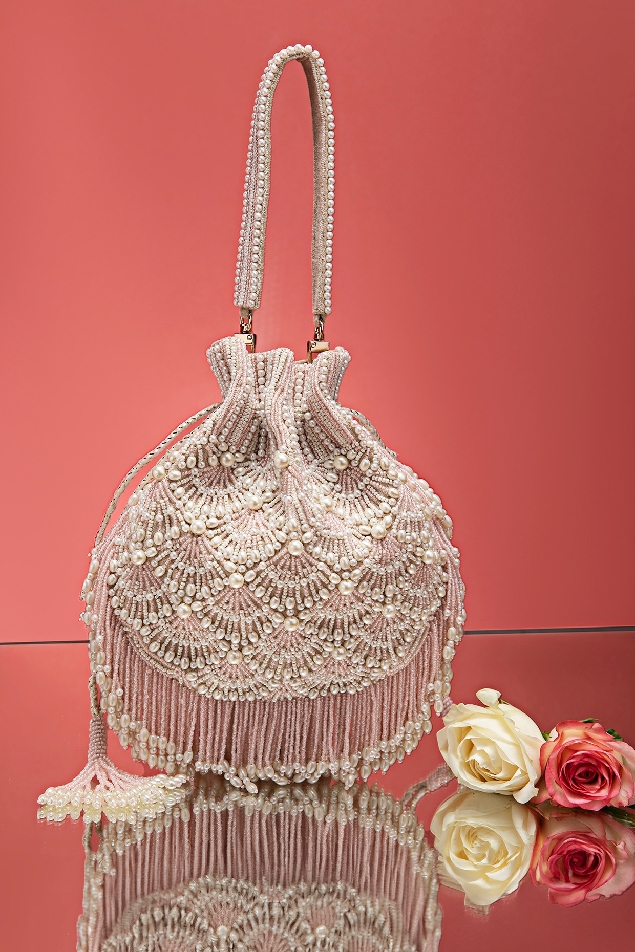 Pink Velvet Bead & Pearl Embellished Potli Bag by POUT AT NINE at ...