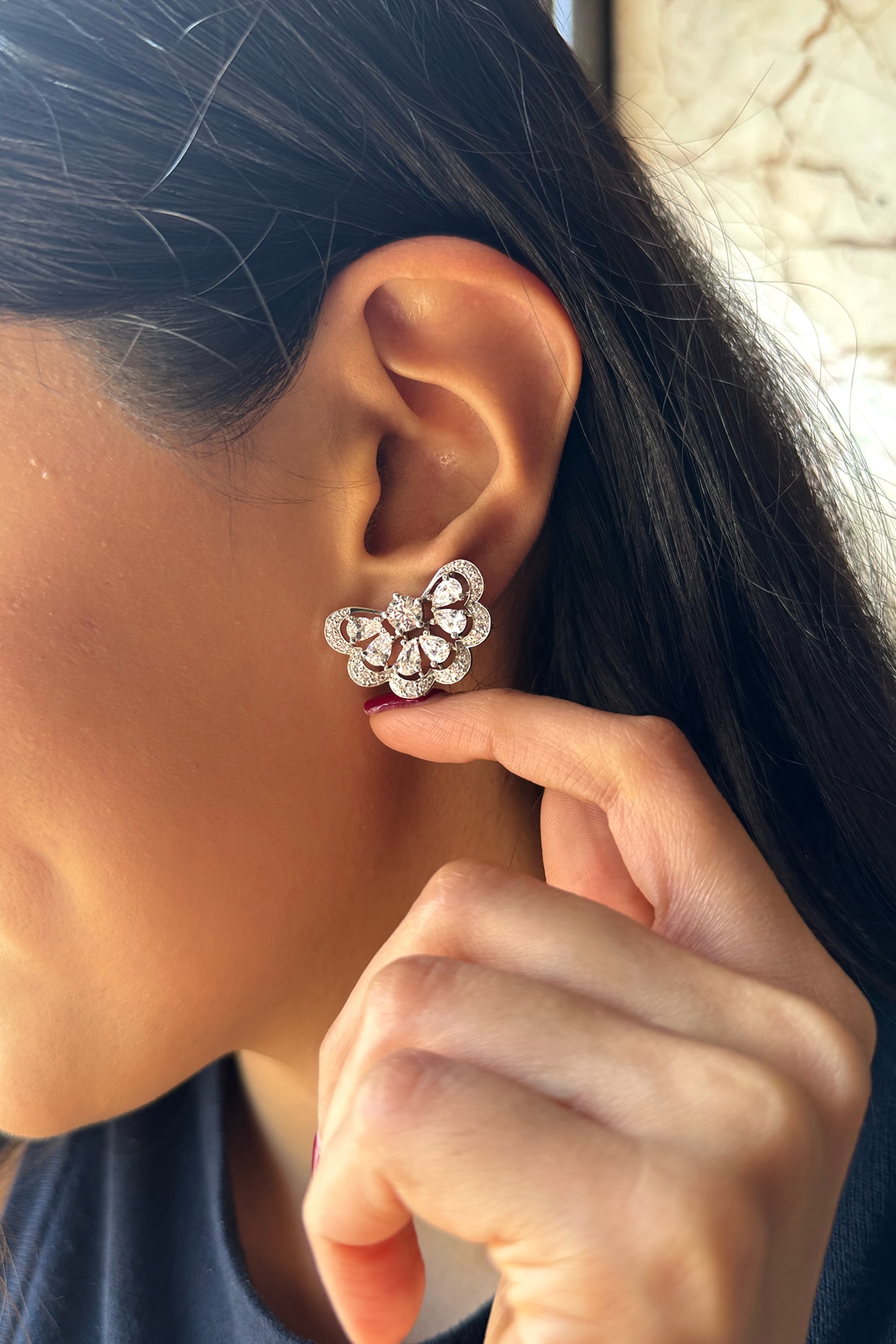 White Finish White Stone Stud Earrings In Sterling Silver by PRATA at ...