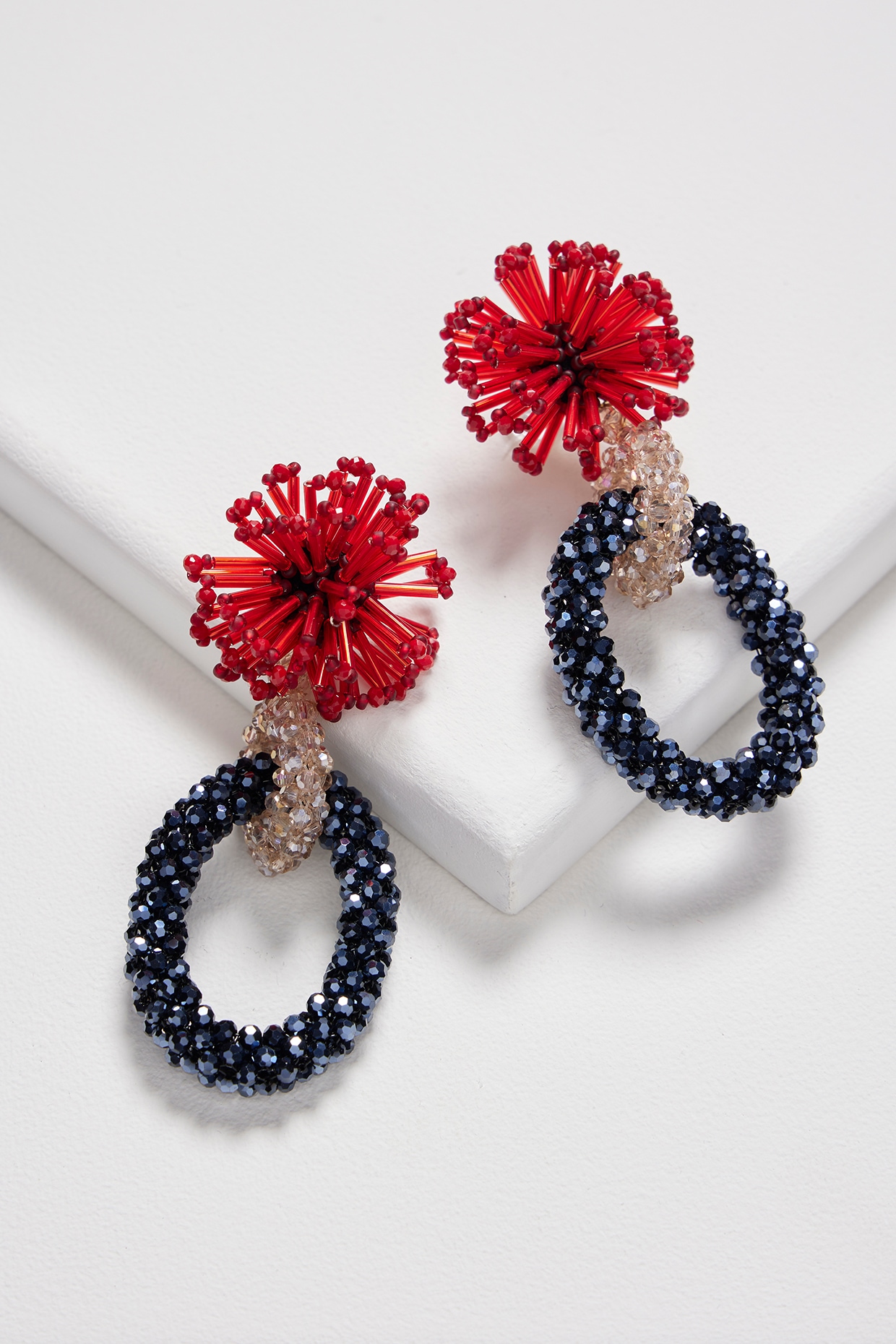 White Finish Red Flower Burst & Crystal Hoop Earrings by Rhea at Pernia ...