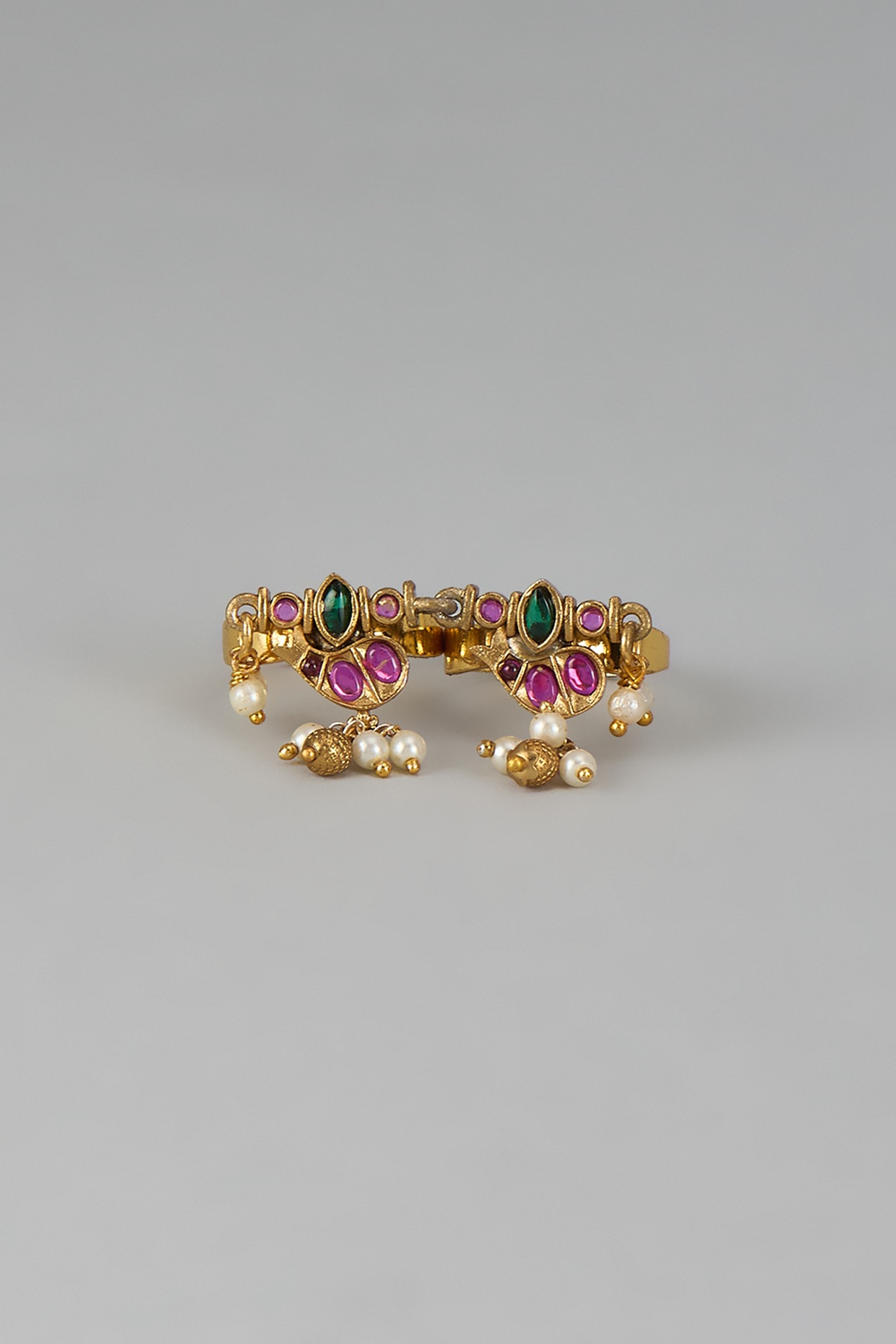 Gold Finish Pink Kemp Stone & Pearl Temple Double Finger Ring by RNG at ...