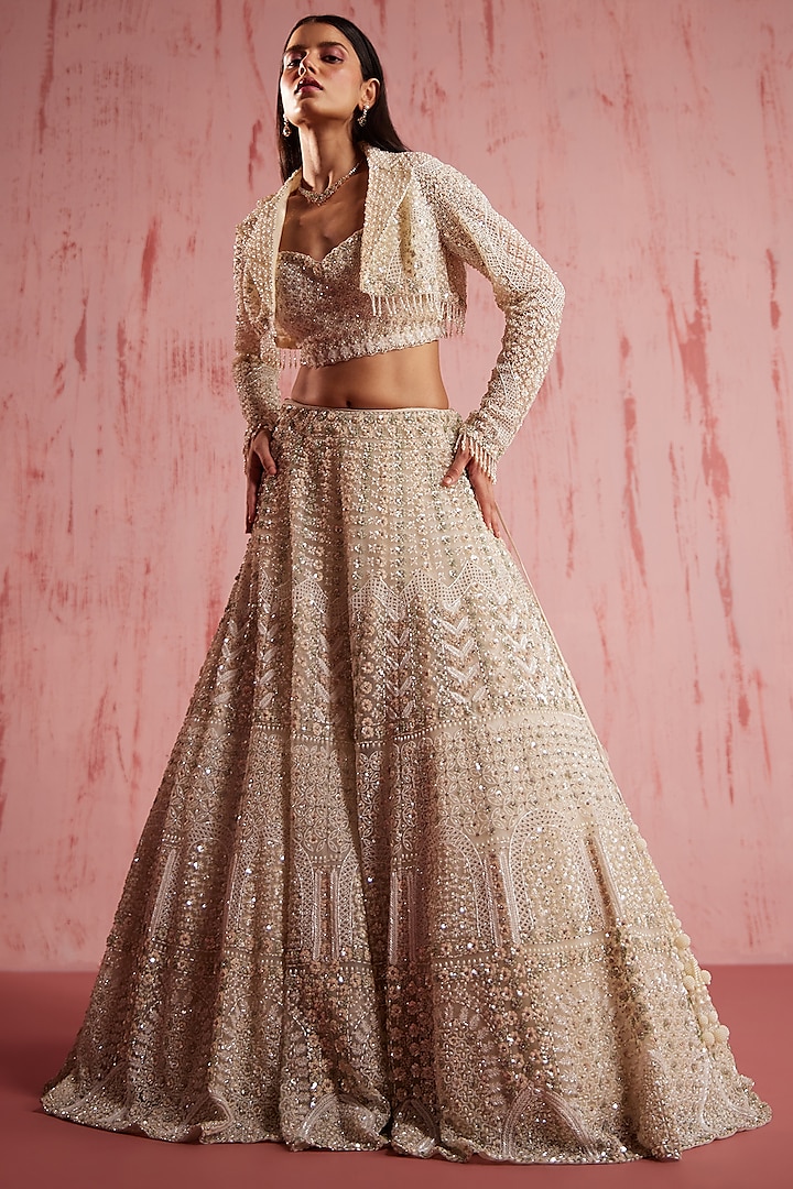 Ivory Net Floral Embroidered Jacket Lehenga Set Design by ROQA at ...