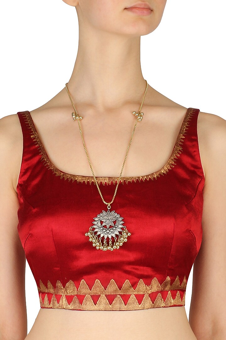 Ritika Sachdeva presents Silver finish floral cutwork pendant long chain necklace available only ...