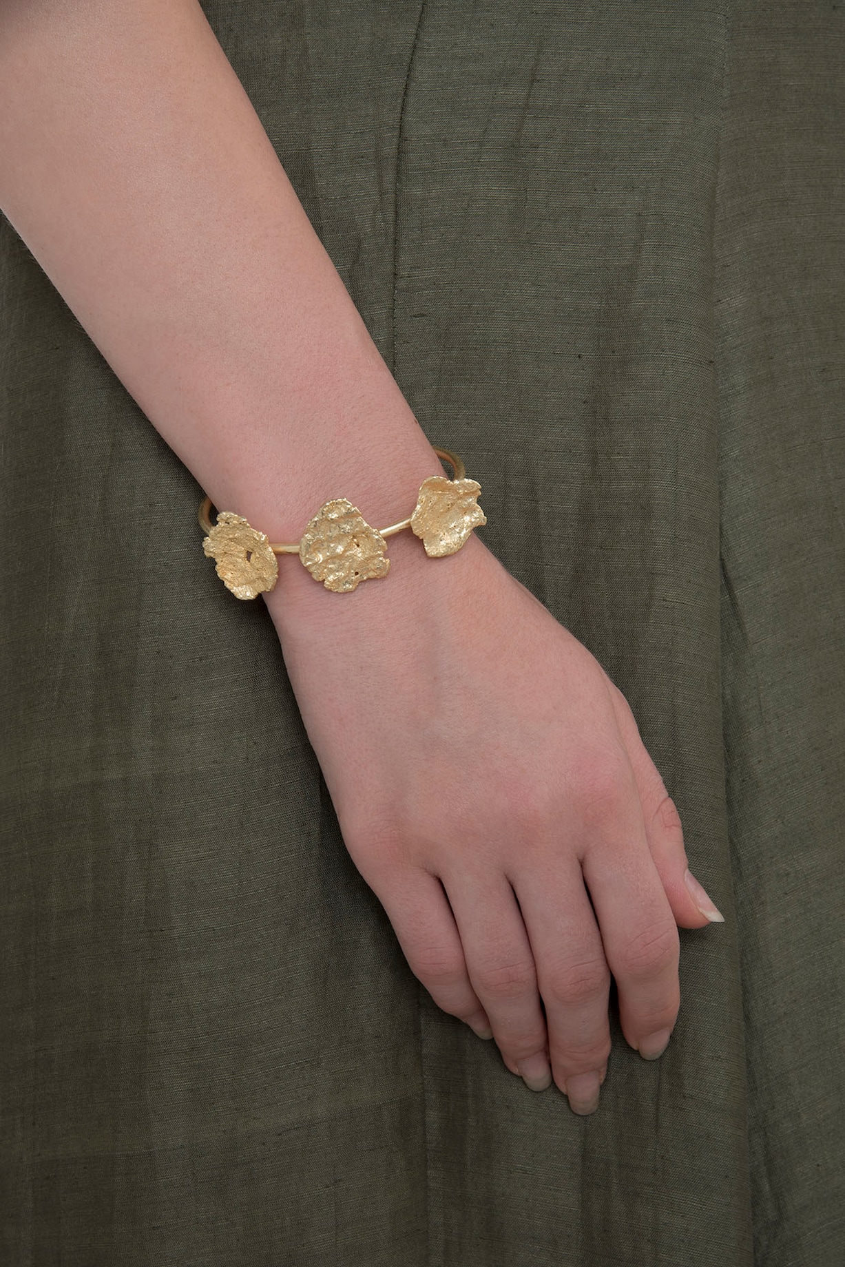 Gold plated textured motifs hand cuff available only at Pernia's Pop Up ...
