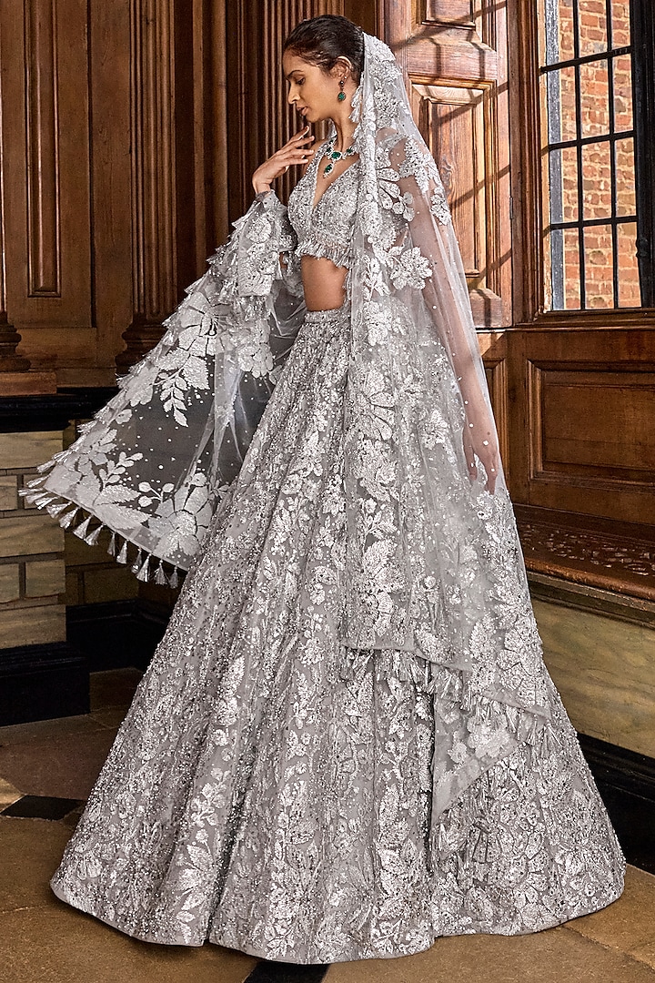 Metallic Silver Net Embroidered Bridal Lehenga Set by Seema Gujral at ...