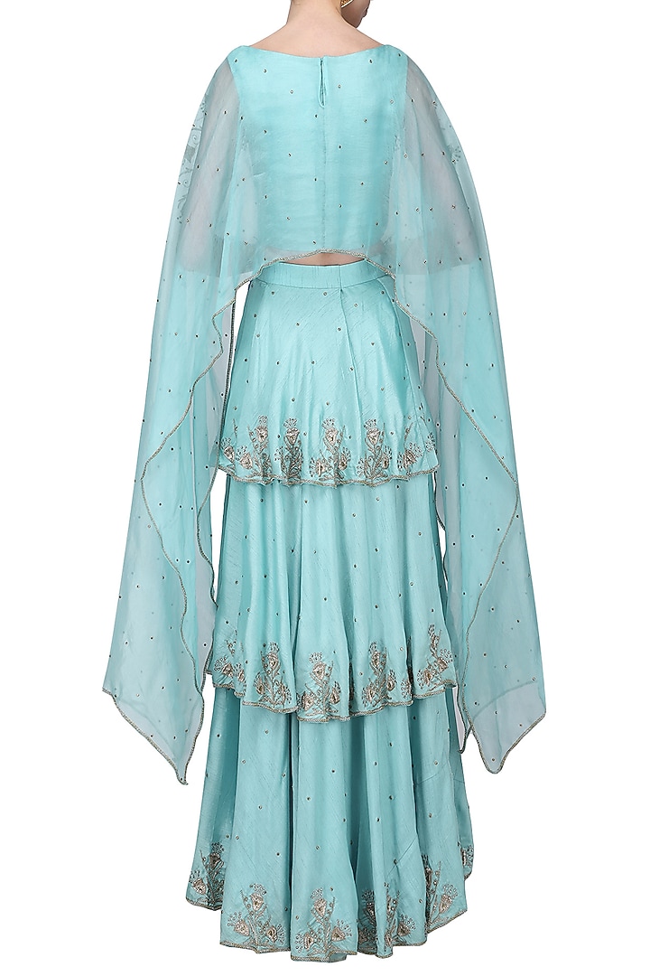 Powder blue crop top with cape and layered lehenga skirt available only ...