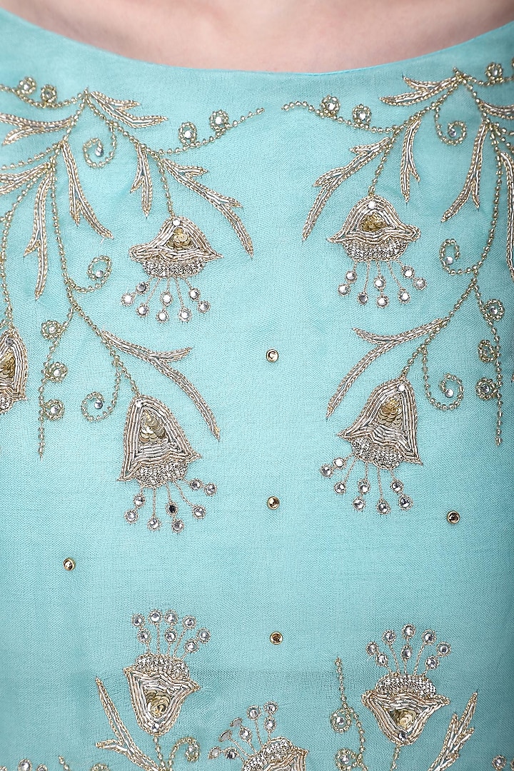 Powder blue crop top with cape and layered lehenga skirt available only ...