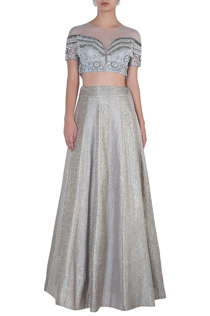 Silver embroidered lehenga set available only at Pernia's Pop Up Shop. 2025