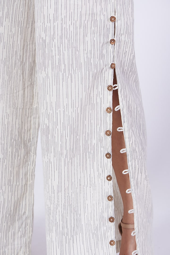 Off-White Block Printed Flared Pants Design by Three Piece Company at ...