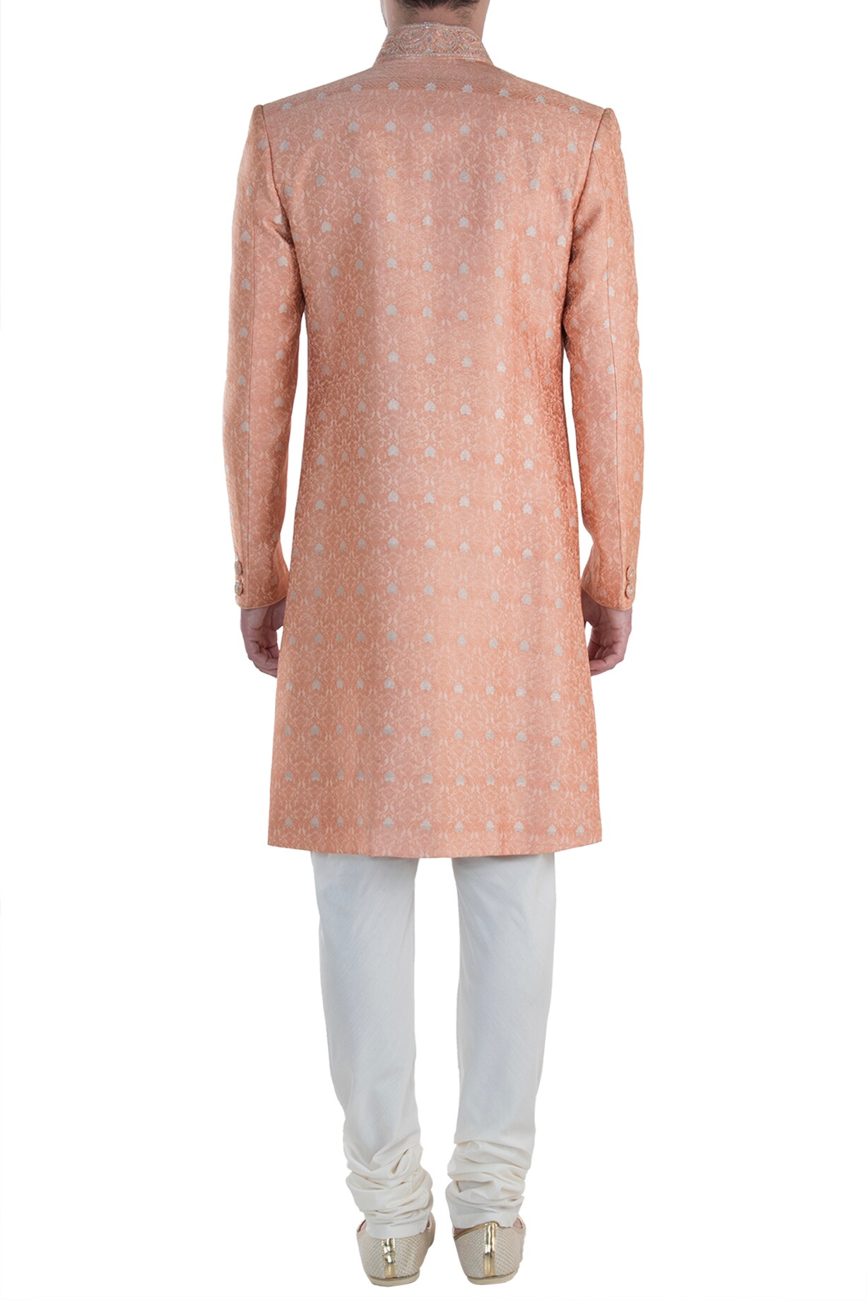 Peach and cream sherwani set available only at Pernia's Pop Up Shop. 2025