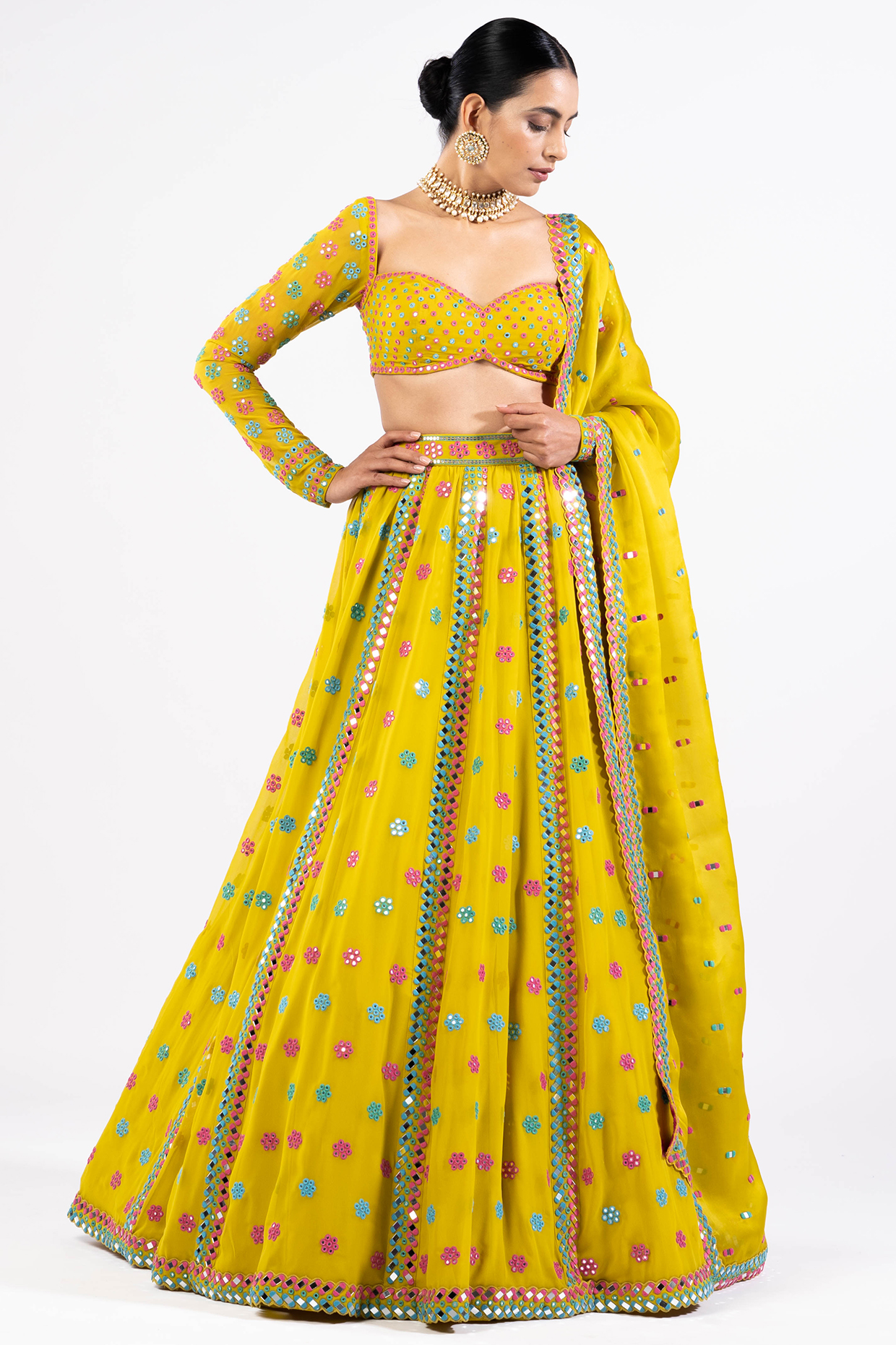 Mustard Georgette Mirror Embellished Bridal Lehenga Set By Vvani By